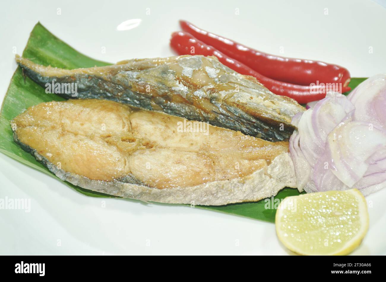 salty dry Indo-Pacific king mackerel fish topping chop shallot and ...