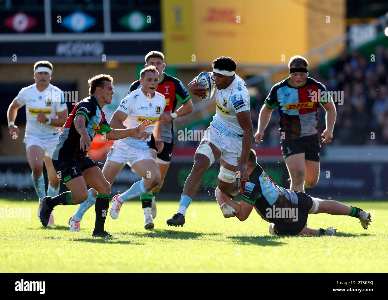 Exeter Chiefs' Greg Fisilau tackled by Harlequins' Jack Kenningham ...
