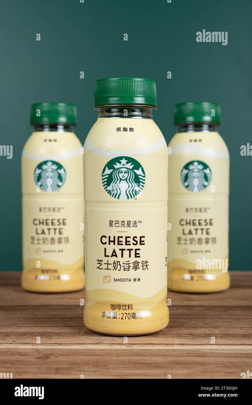 ZHONGSHAN China-October 19,2023:3 bottles of Starbucks cheese latte on ...