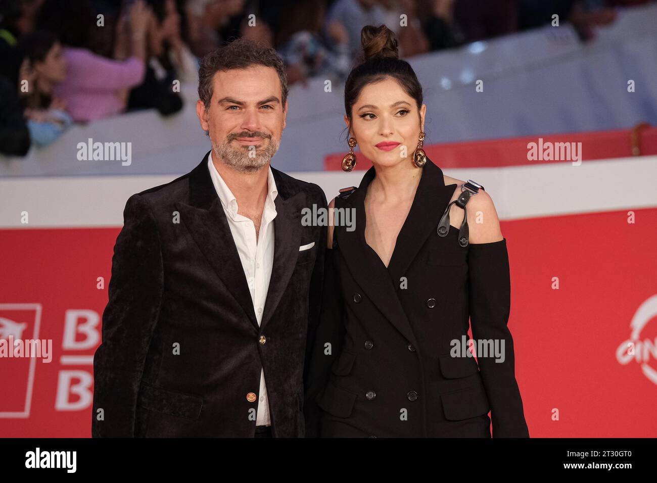 Andrea Perroni (L) and Eva Cela (R) attend a red carpet for the movie ...