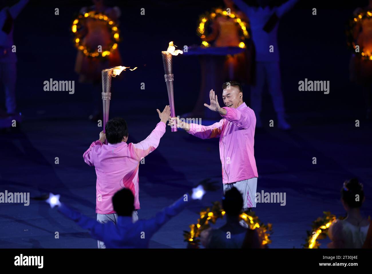 Passing the torch hi-res stock photography and images - Alamy