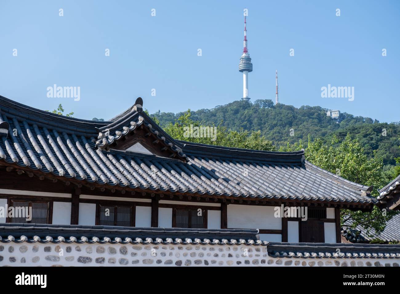 Traditional Korean building in Namsangol Hanok village, with view of N ...