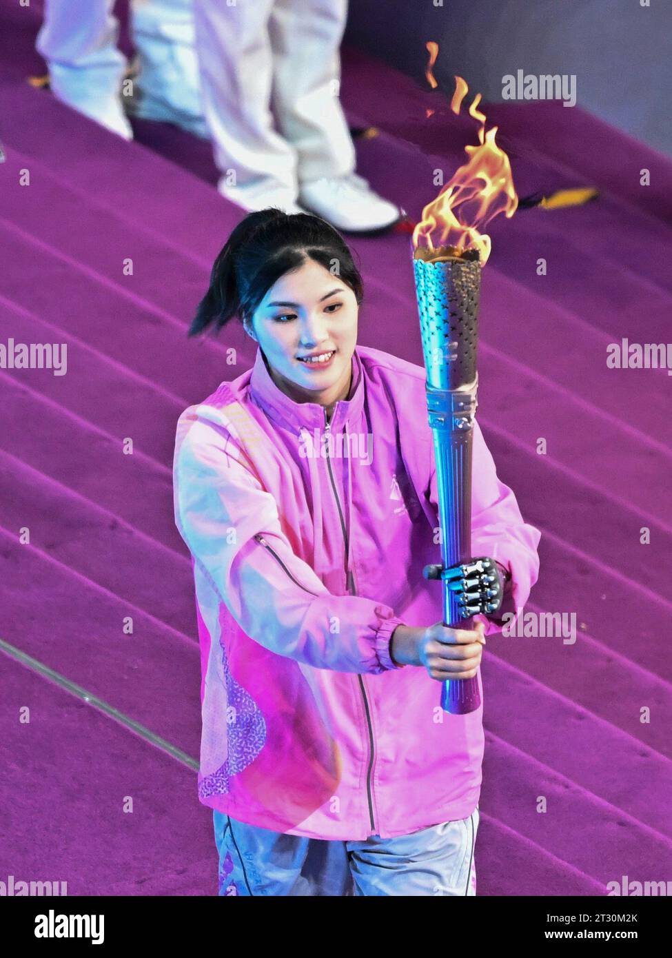 Hangzhou. 22nd Oct, 2023. Torch bearer Xu Jialing relays the torch ...
