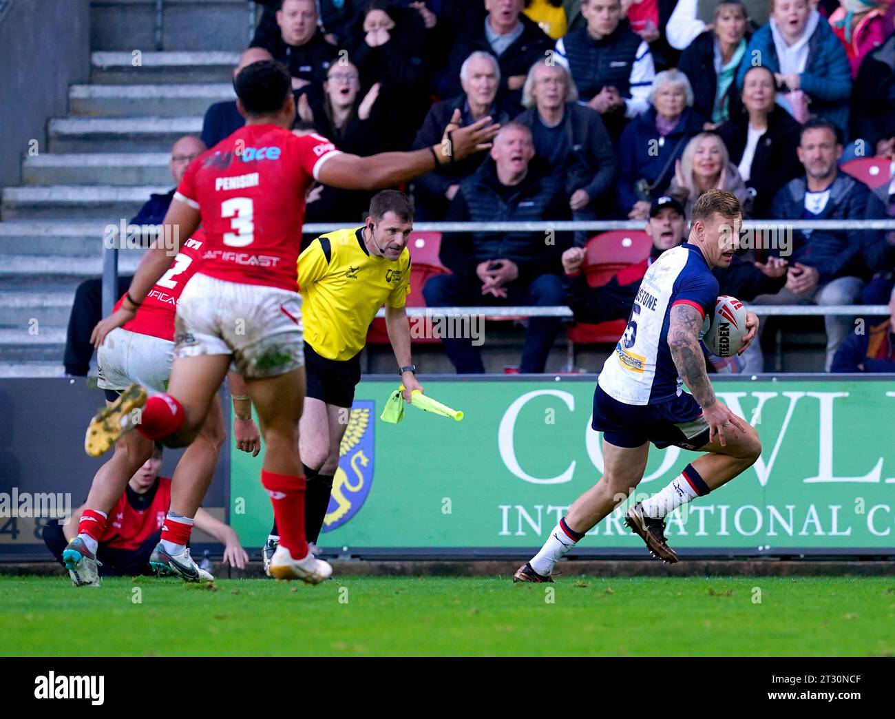 England's Tom Johnstone on his way to score a try during the ...