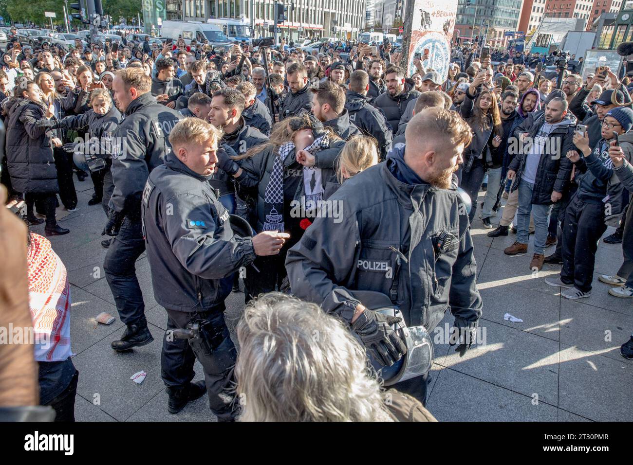 Amidst the backdrop of the pro-Israel rally at the Brandenburg Gate ...