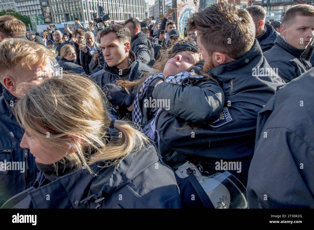 Amidst the backdrop of the pro-Israel rally at the Brandenburg Gate ...