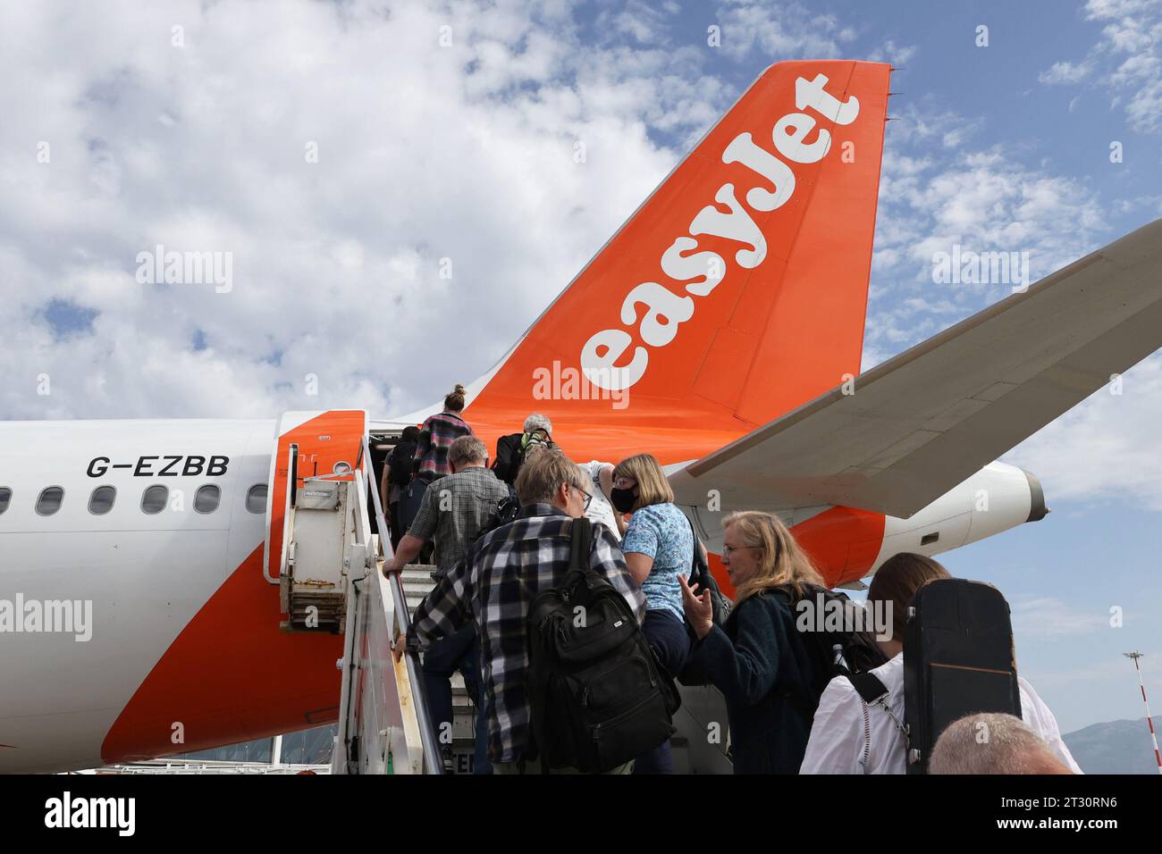 Passengers boarding an easyJet Airbus at Falcone-Borsellino airport in ...