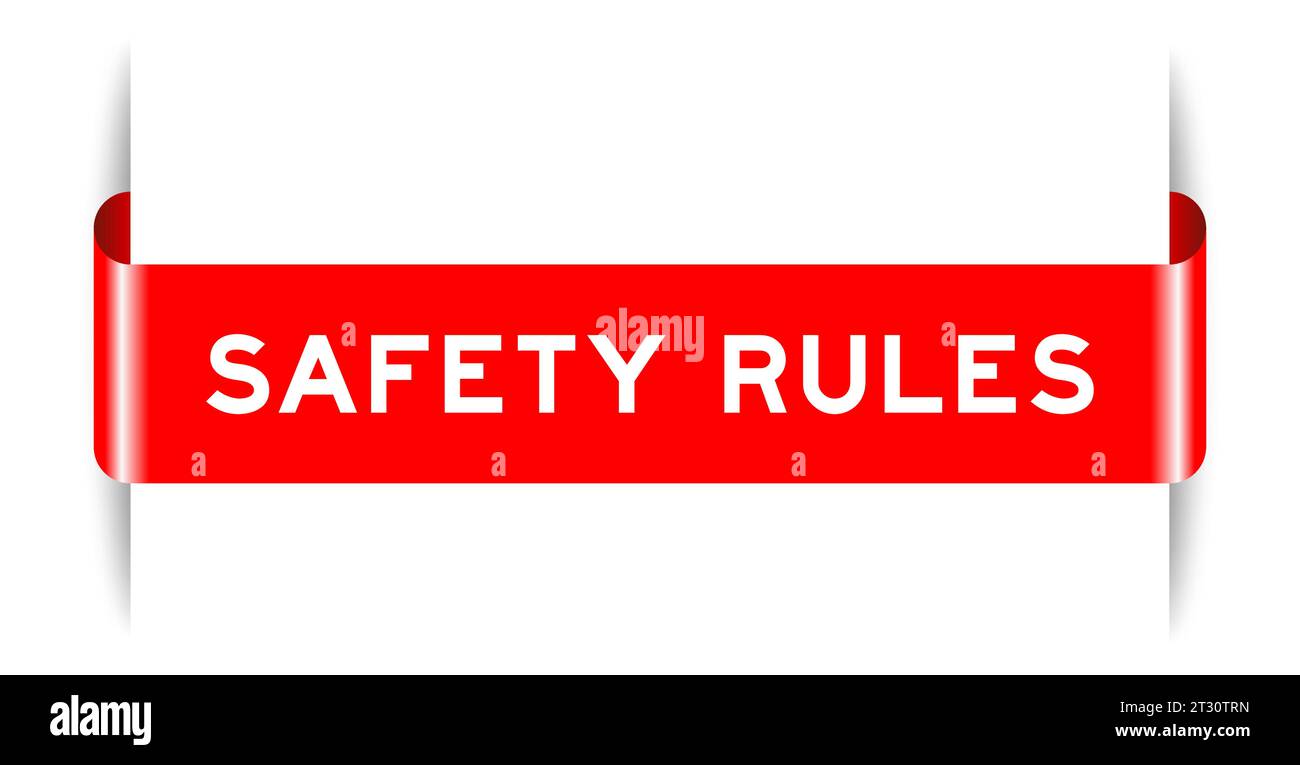 Red color inserted label banner with word safety rules on white ...