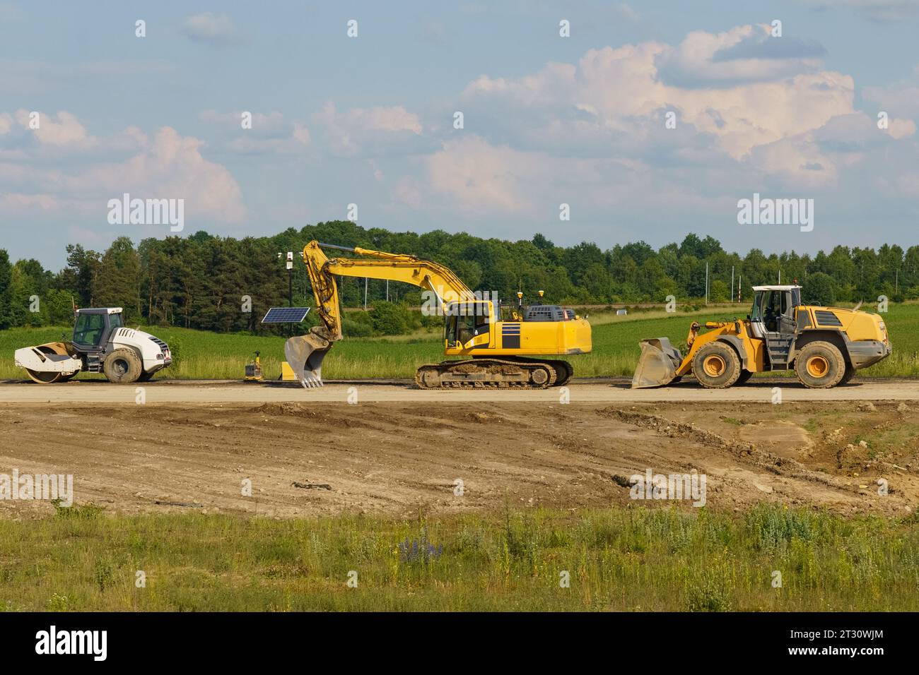 Heavy road equipment for road construction and repair. Construction of ...