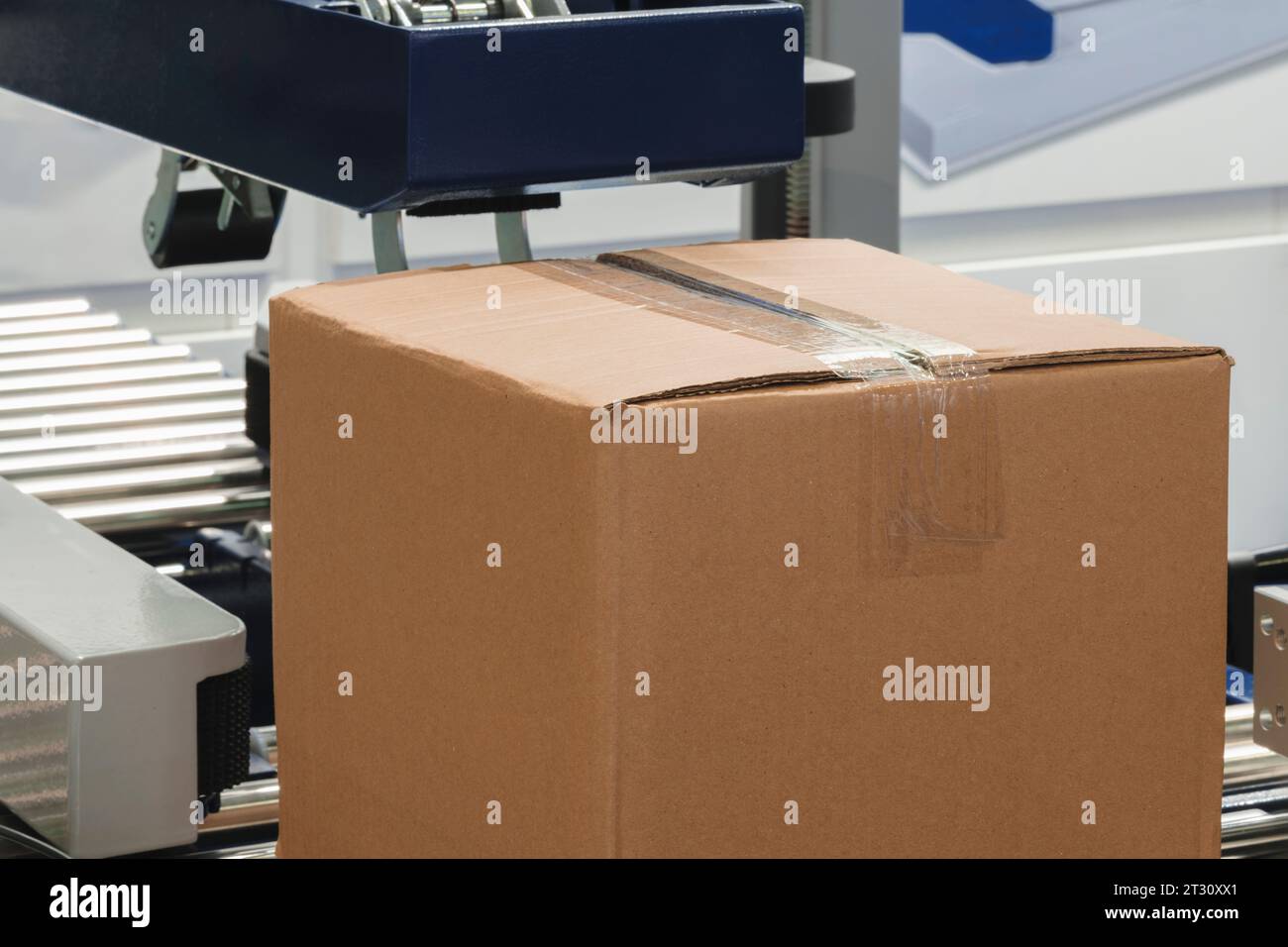 Cardboard boxes on a pallet ready for delivery in a warehouse ...