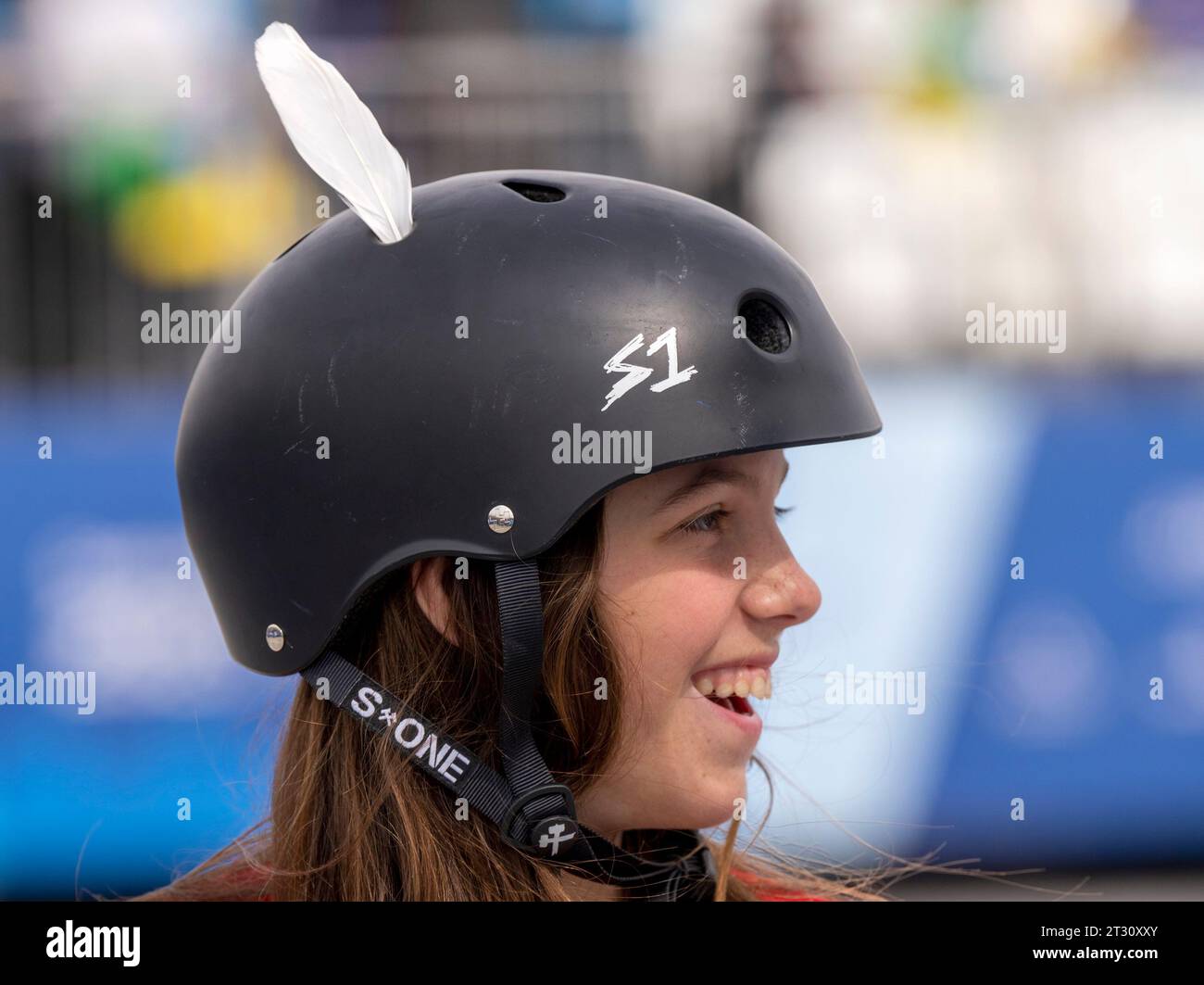 Canada's Fay De Fazio Ebert, of Toronto, wears a feather from her pet ...