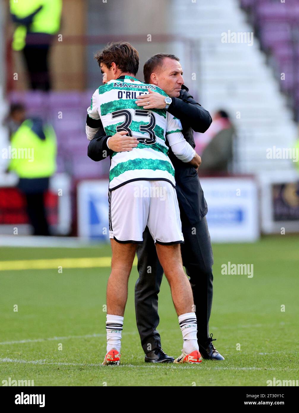 Celtic manager Brendan Rodgers hugs Matt O'Riley at the end of the ...