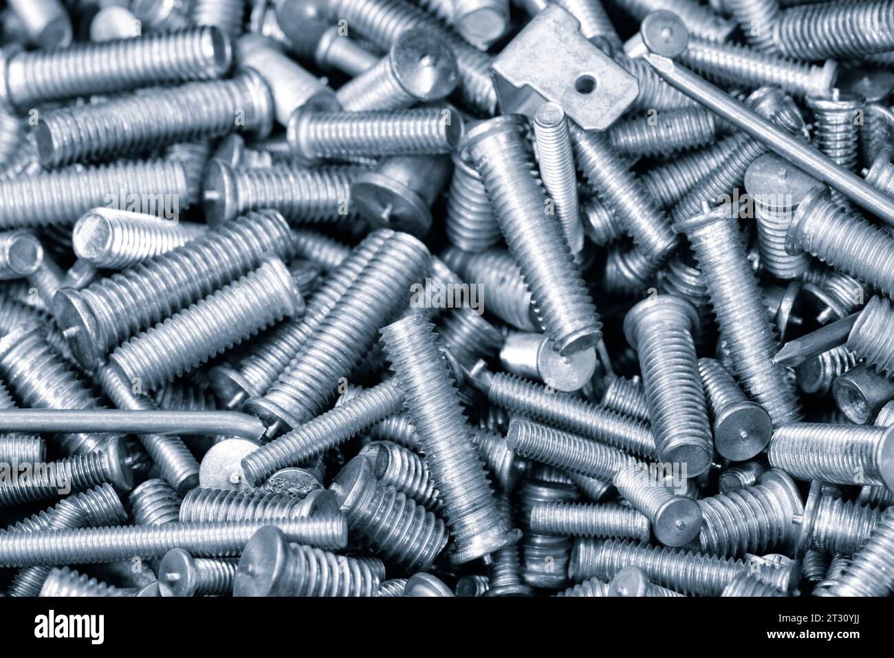 Texture background of metal products screws, nozzles, bolts and studs ...