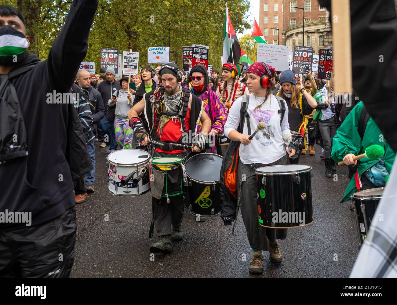 London / UK - Oct 21 2023: Pro-Palestinian protesters play drums next ...