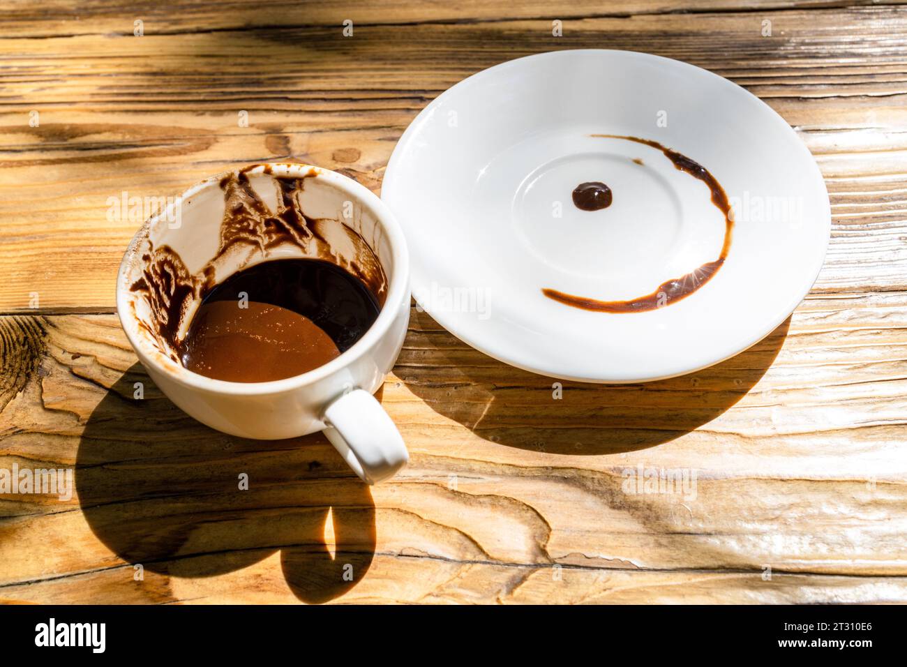 cup of Turkish coffee with grounds and patterns left after drinking and ...
