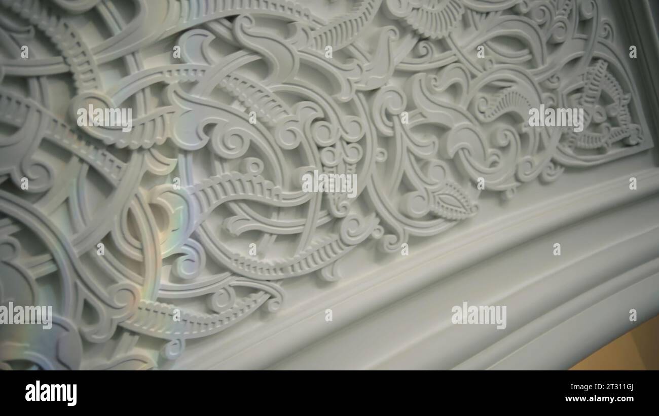 White patterns on walls of temple. Scene. Beautiful reliefs of white ...