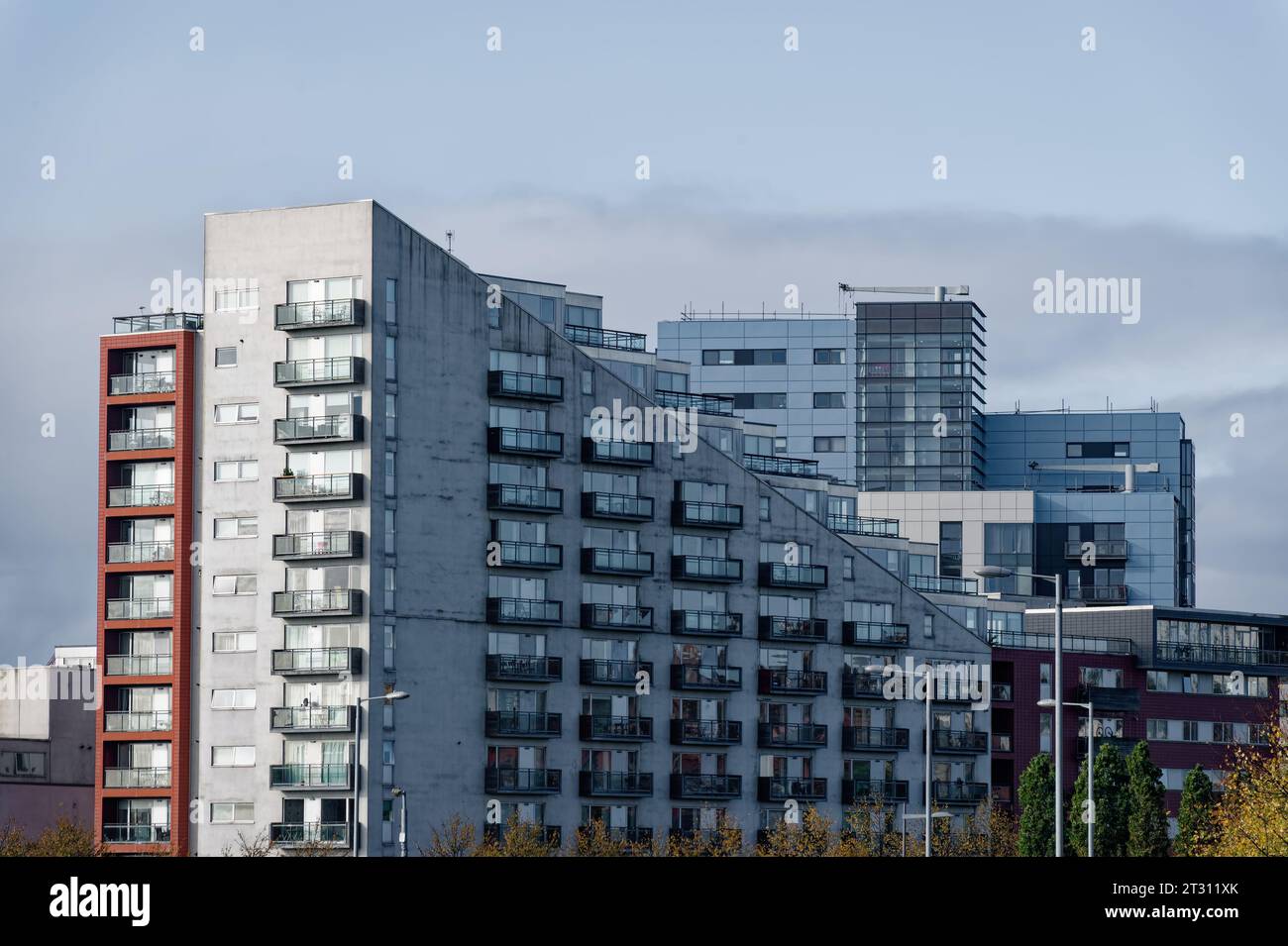 Modern high rise flats at new development on waterfront Stock Photo - Alamy