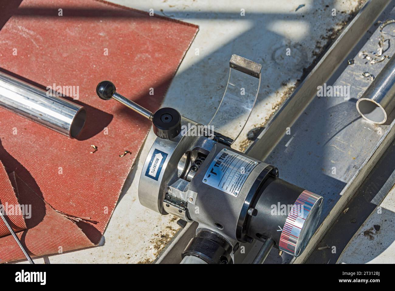 A tube facing and squaring tool is used on stainless steel tubing used ...