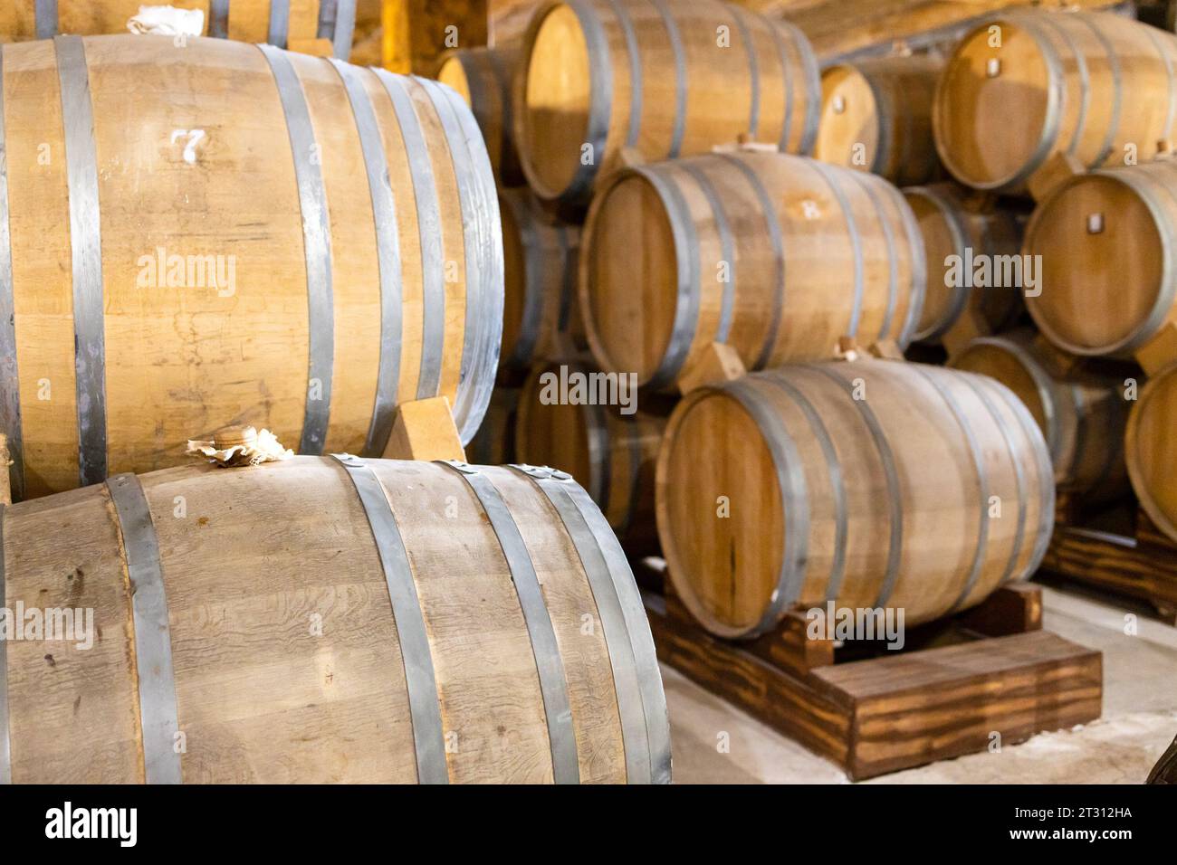 Yerevan, Armenia - October 2, 2023: many wooden barrels with brandy in ...