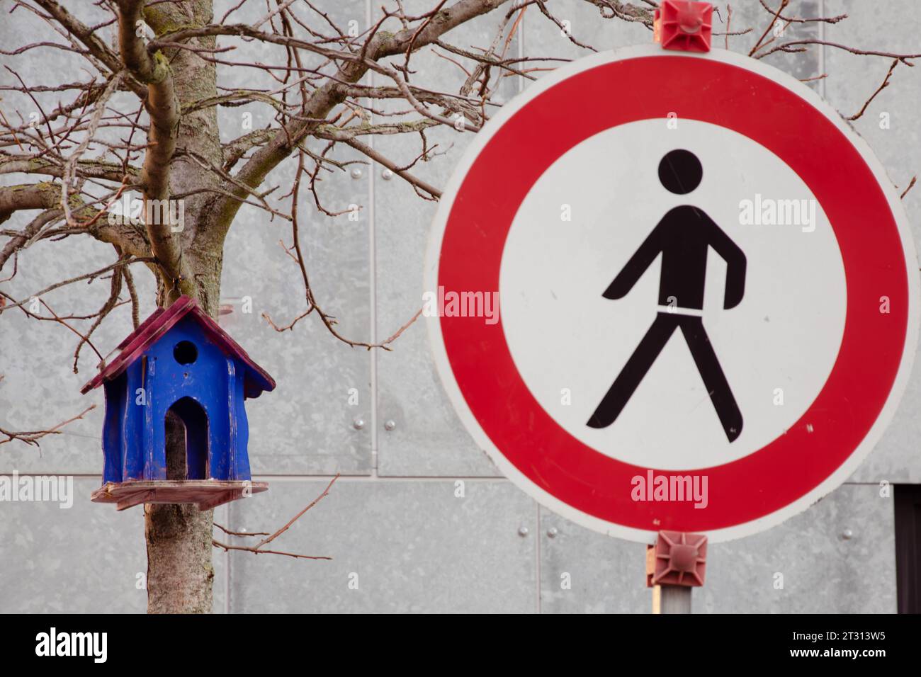 A circular prohibitive road sign - Pedestrian traffic is prohibited. A ...