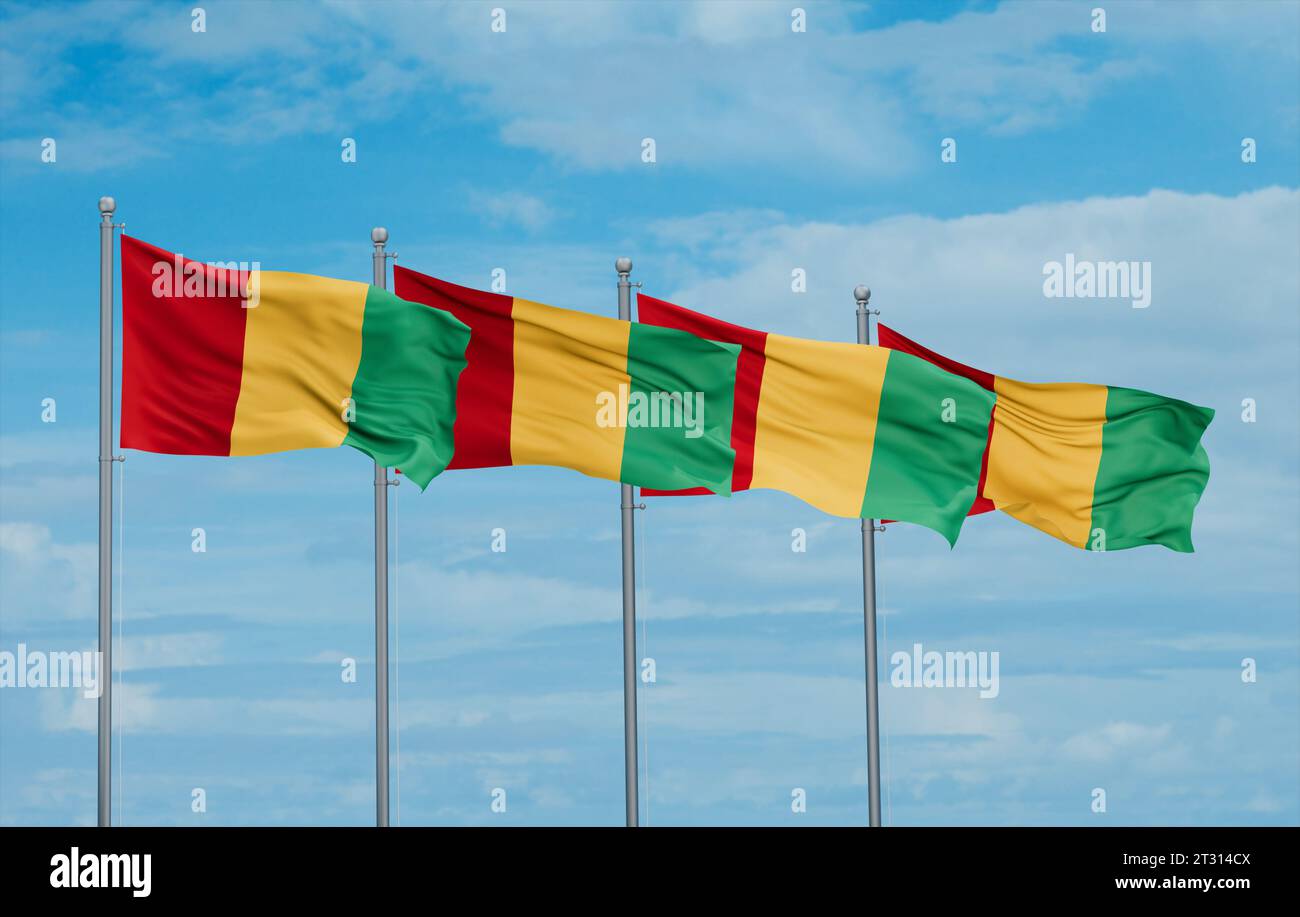 Guinea-Conakry four flags in row waving together on blue cloudy sky ...