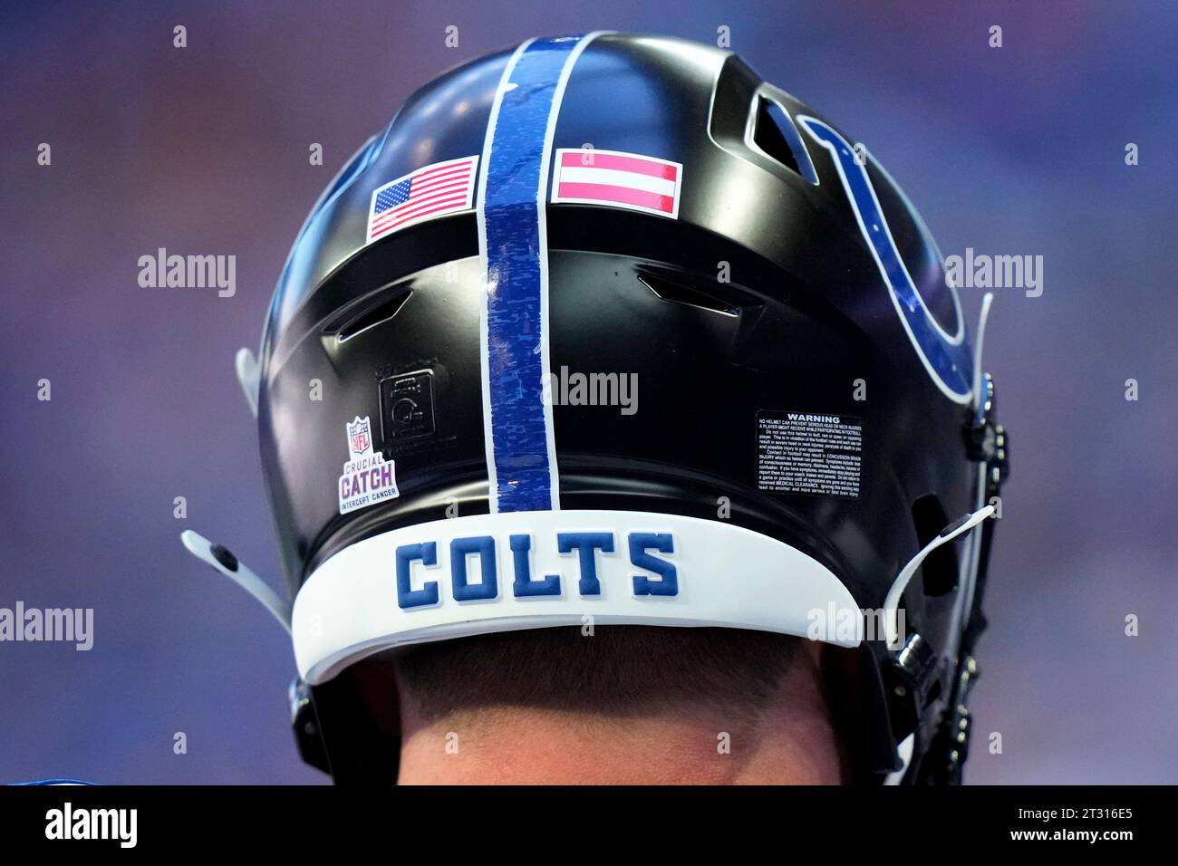 Flag decals are seen on the back of Indianapolis Colts offensive tackle ...