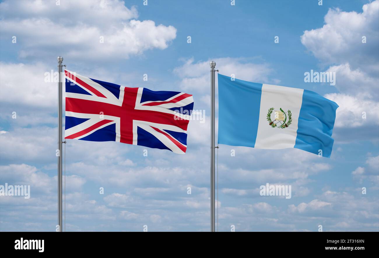 Guatemala and Brazil flags waving together on blue cloudy sky, two country relationship concept ...