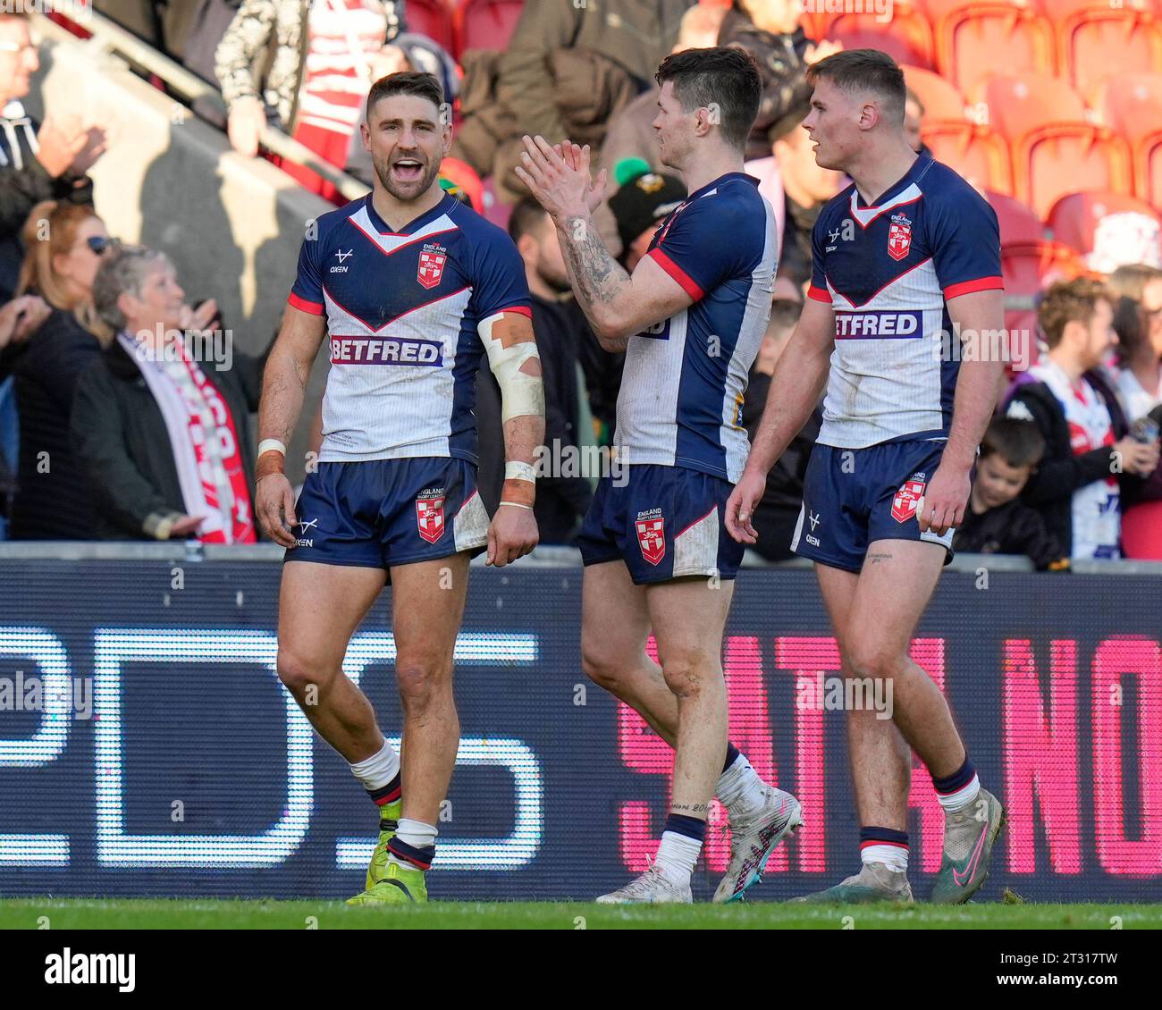 St Helens, UK. 22nd Oct, 2023. Tommy Makinson #2 of England, John ...