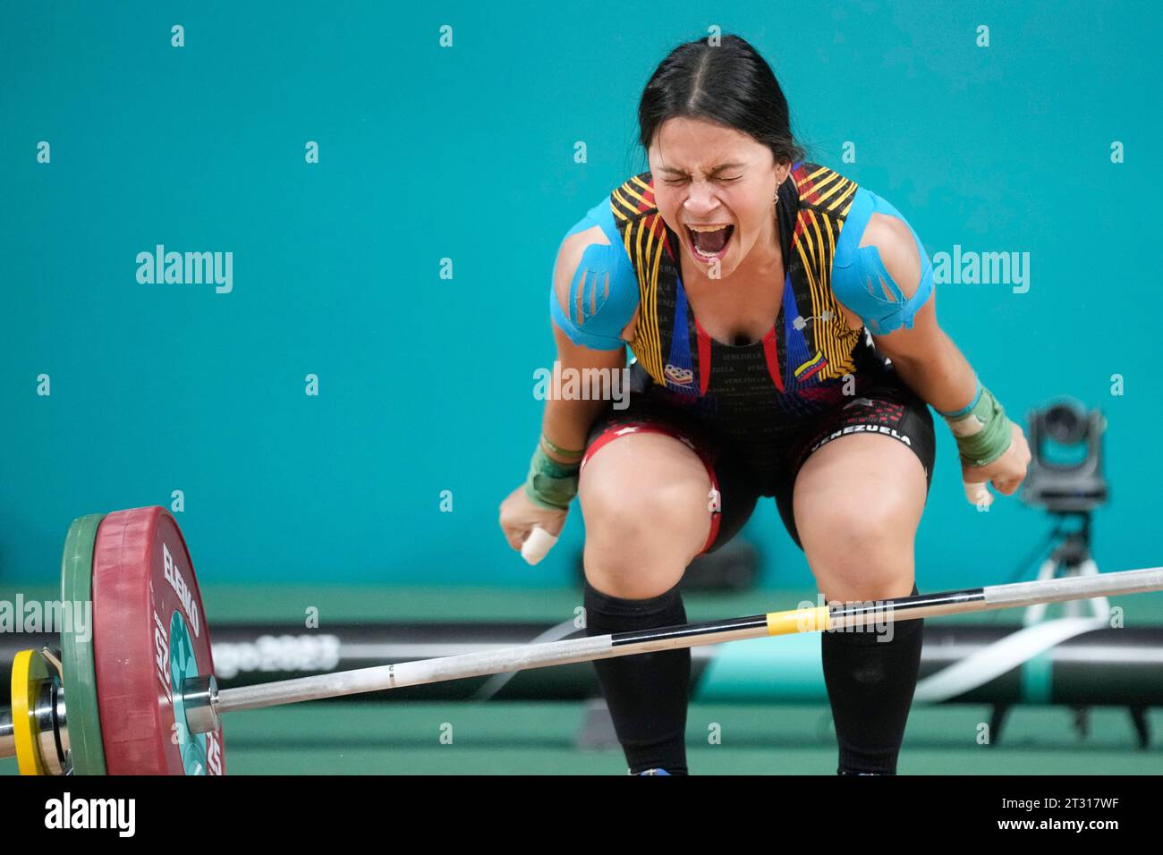 Colombia's Anyelin Venegas reacts after lifting in the women's ...