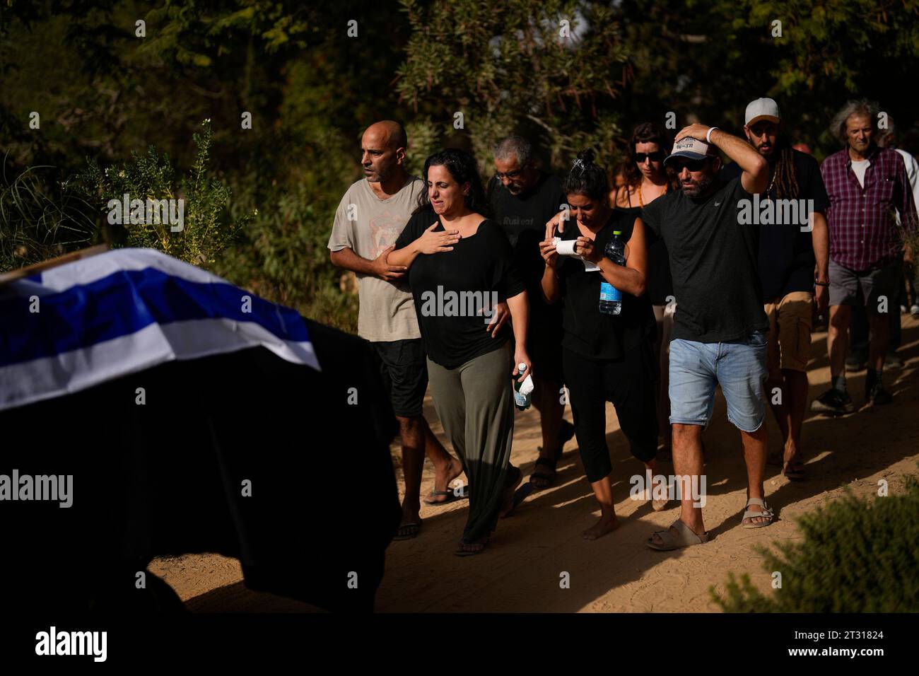 Family members mourn during the funeral of Maayan Bar and Yuval Bar at ...