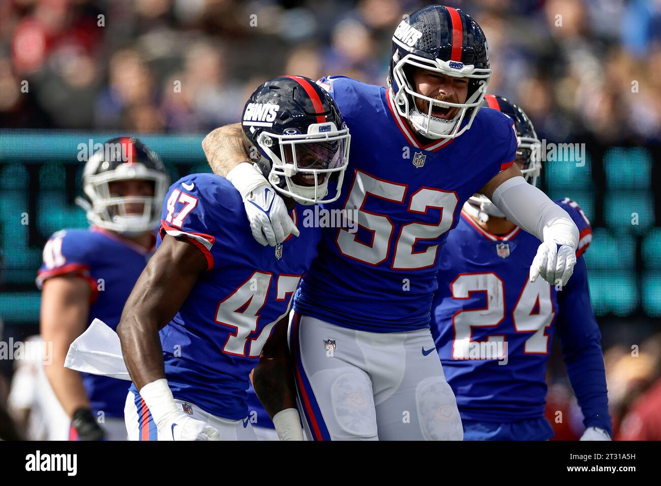 New York Giants linebacker Cam Brown (47) celebrates with linebacker ...