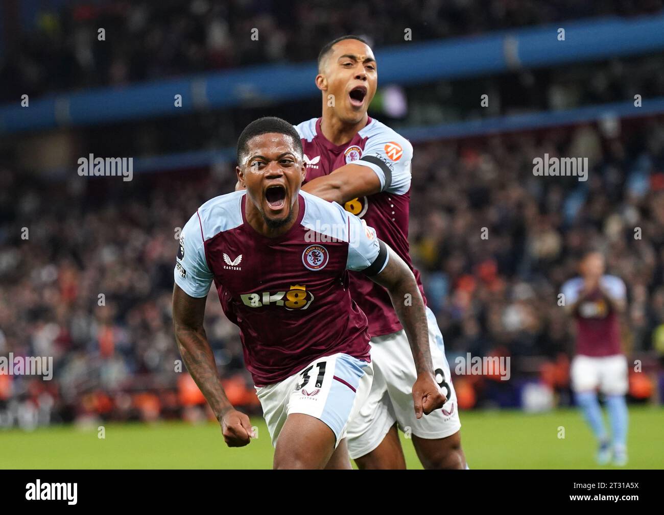 Aston Villa's Leon Bailey (left) celebrates scoring their side's fourth ...