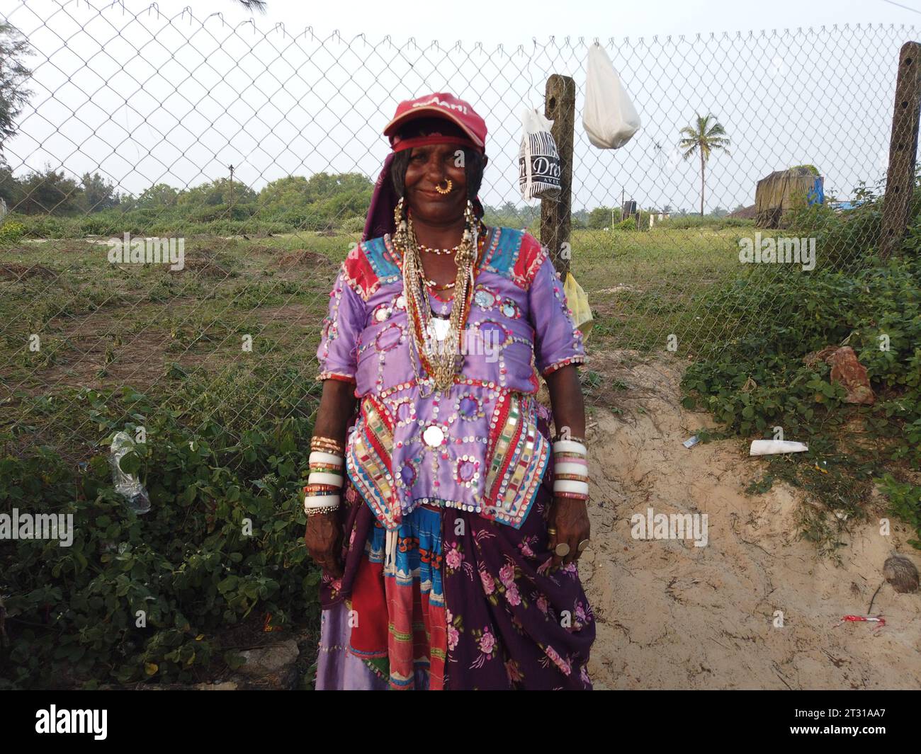 An Indian gypsy hawker woman on Cavelossim beach in Indian state of Goa ...