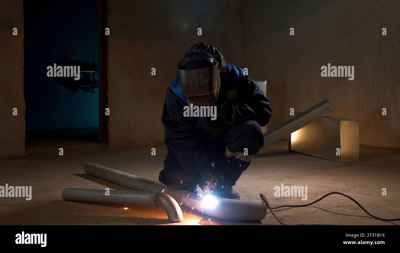 Portrait of a worker. Clip. A strong experienced man has finished the ...