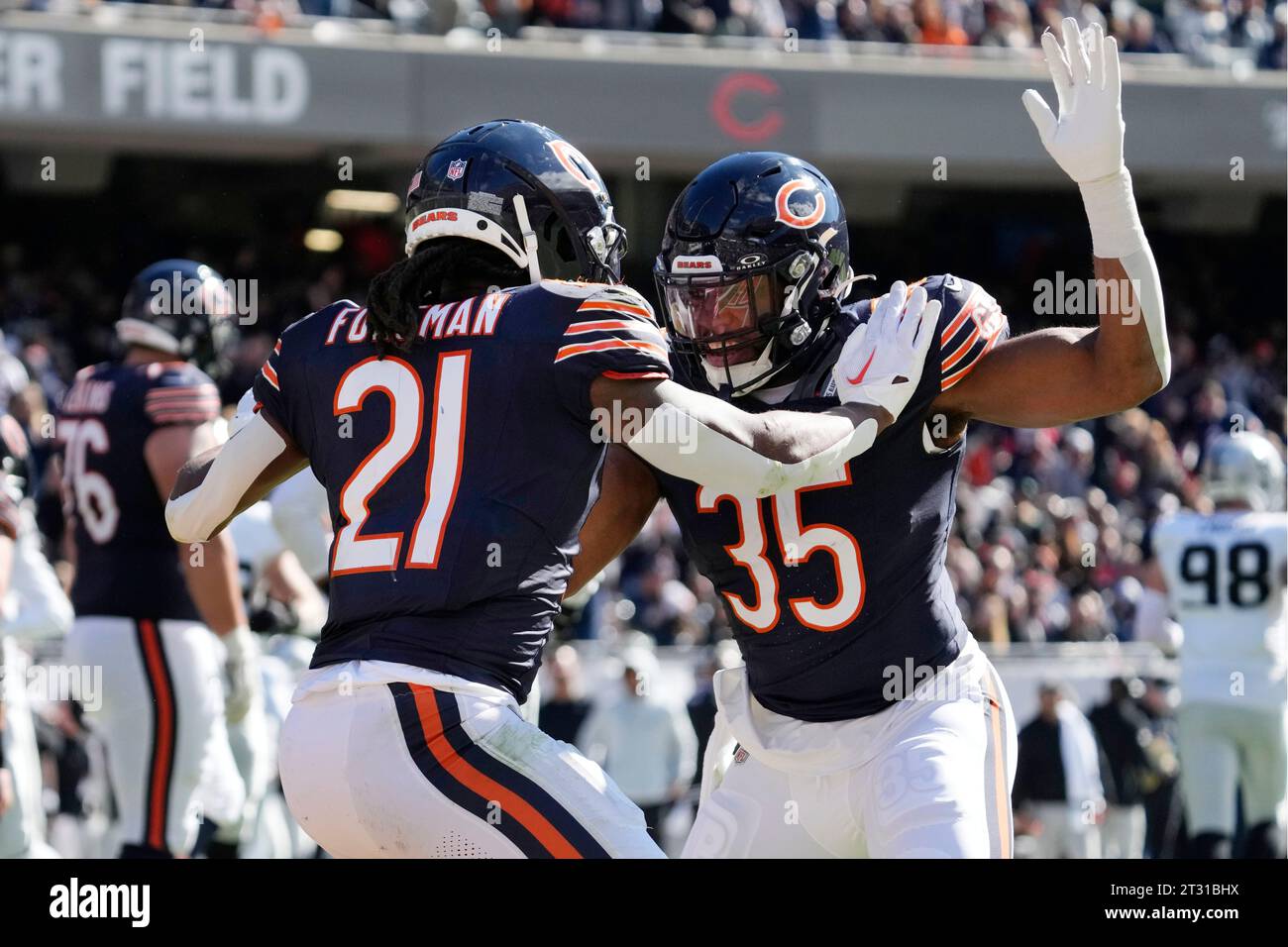 Chicago Bears running back D'Onta Foreman (21) celebrates with fullback ...