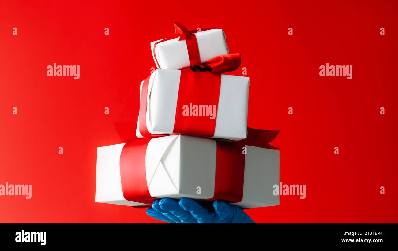 Birthday gift present delivery hand wrapped boxes Stock Photo - Alamy