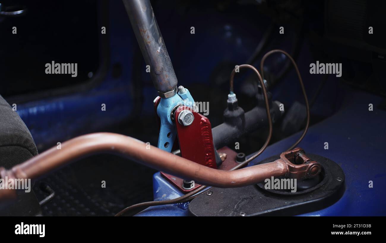 Close-up details of mechanisms of car. Clip. Levers inside old car ...