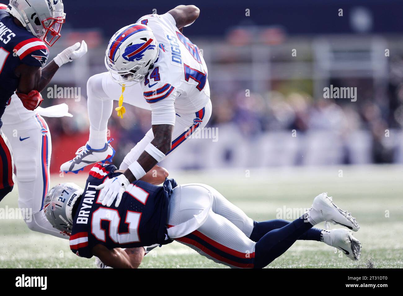 Buffalo Bills wide receiver Stefon Diggs (14) is tackled by New England ...