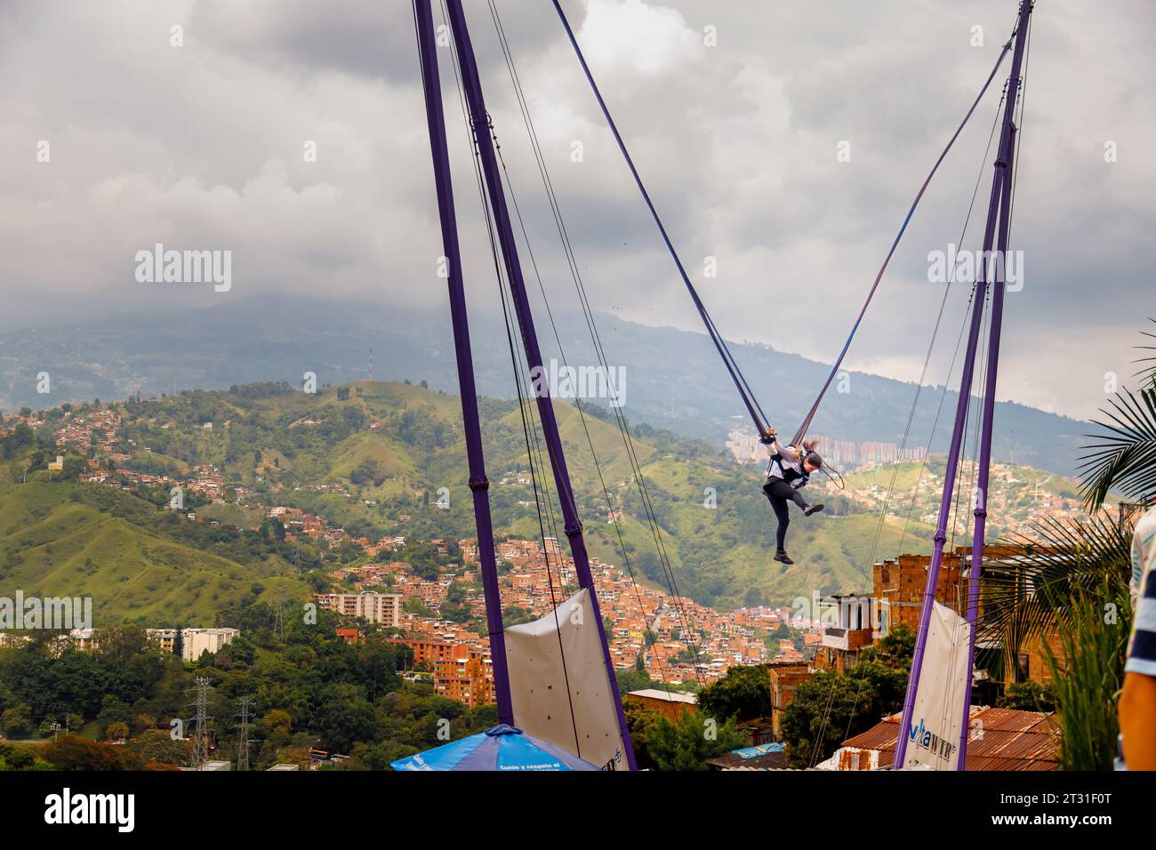 Medellin, Colombia - January 9, 2023: Young tourist woman does bungee ...