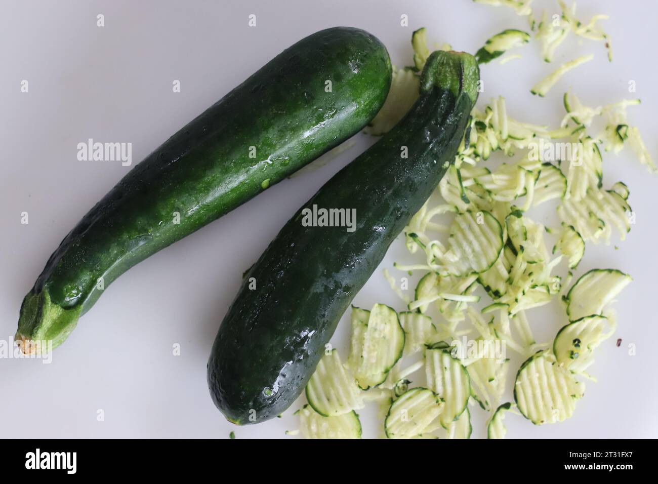 Lush, green zucchini, a courgette species vegetable or otherwise called ...