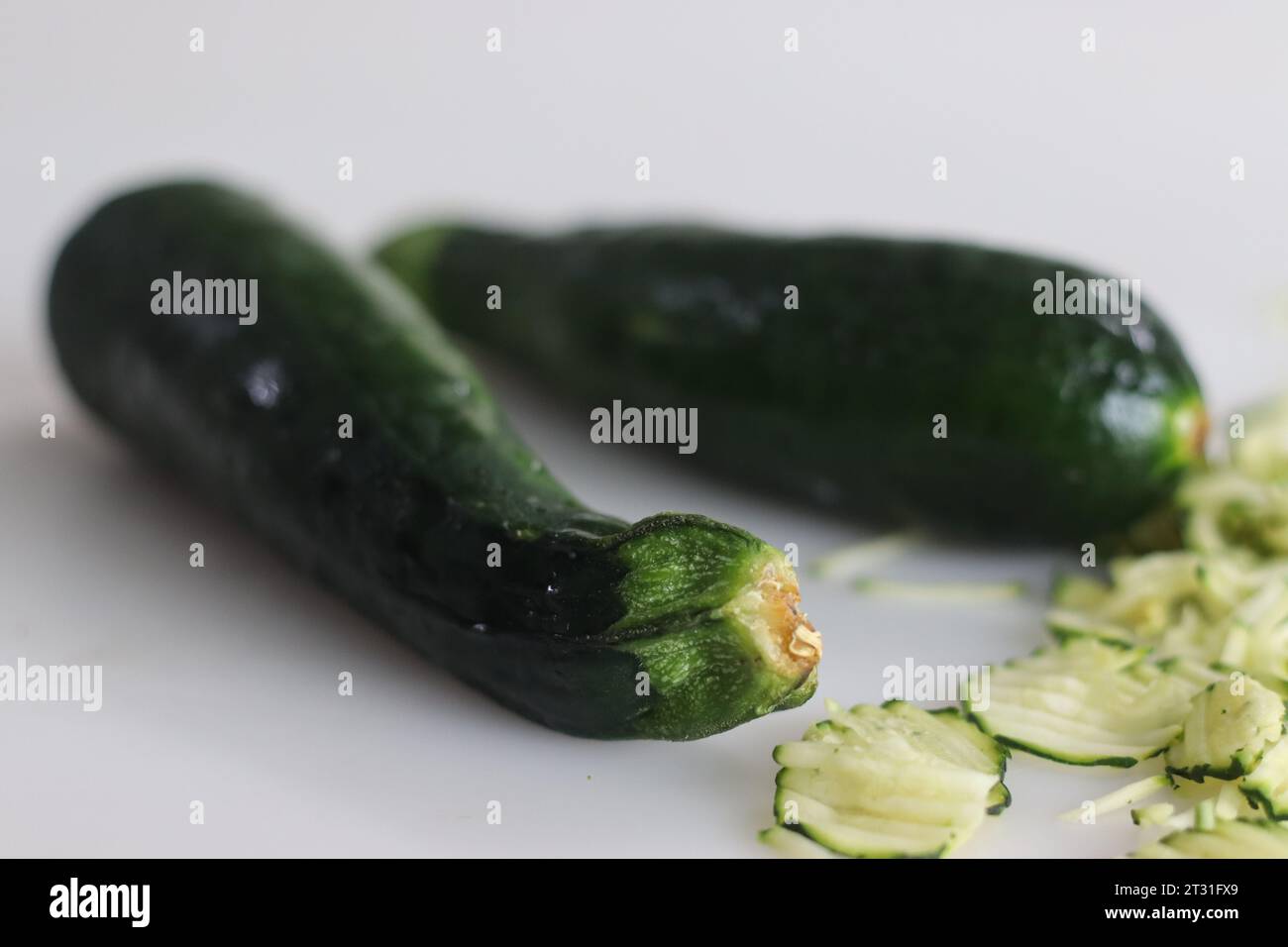 Lush, green zucchini, a courgette species vegetable or otherwise called ...