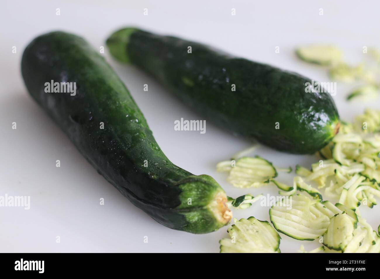 Lush, green zucchini, a courgette species vegetable or otherwise called ...