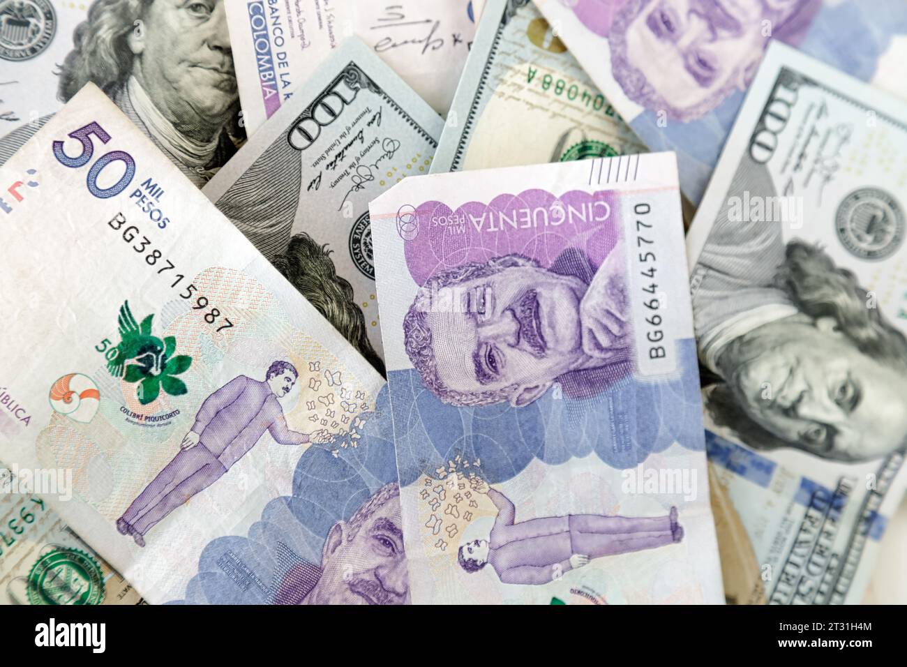 Close-up of bills of 50 thousand Colombian pesos and bills of 100 ...