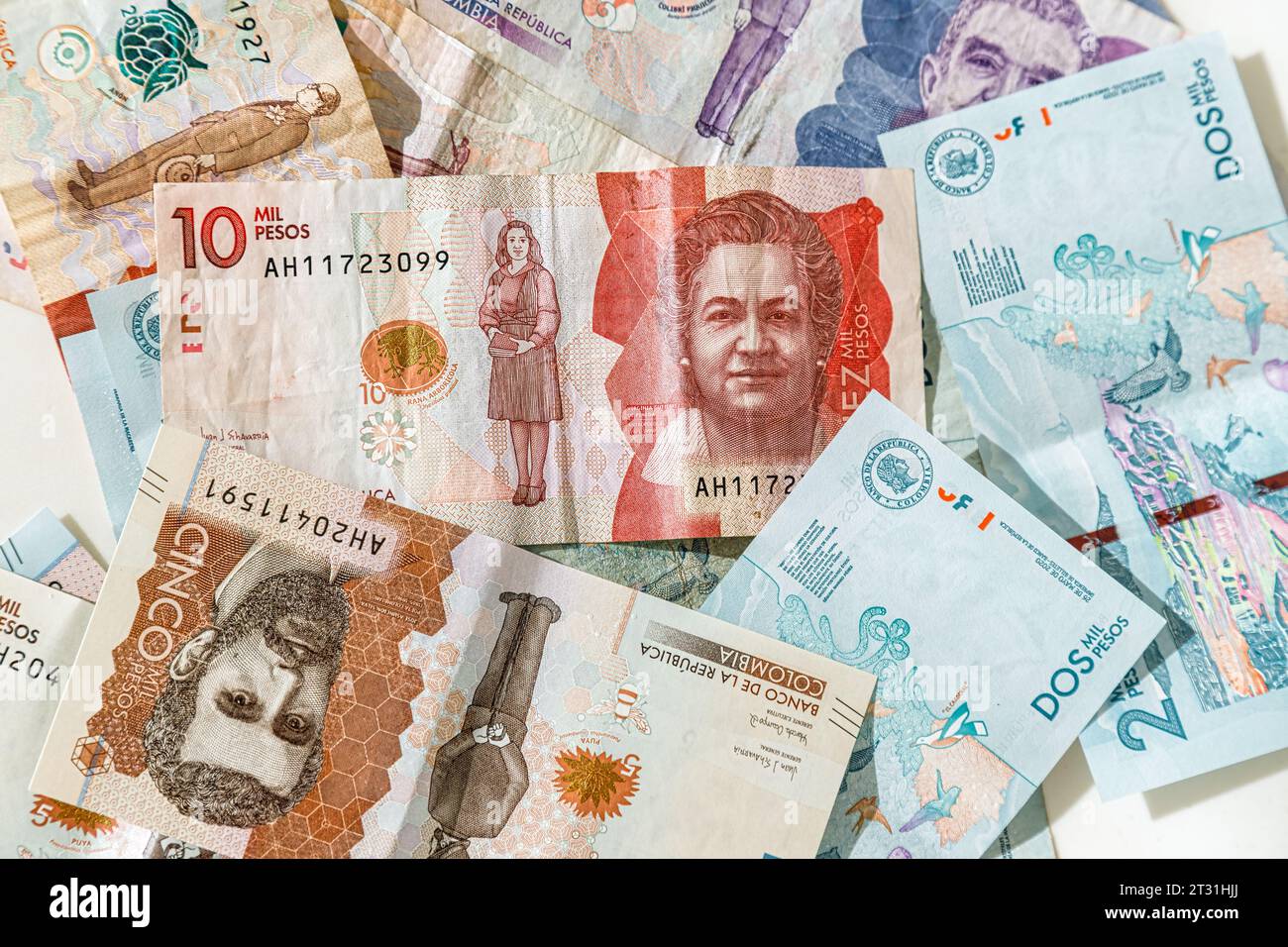 Macro closeup of Colombian peso bills of different denominations Stock ...