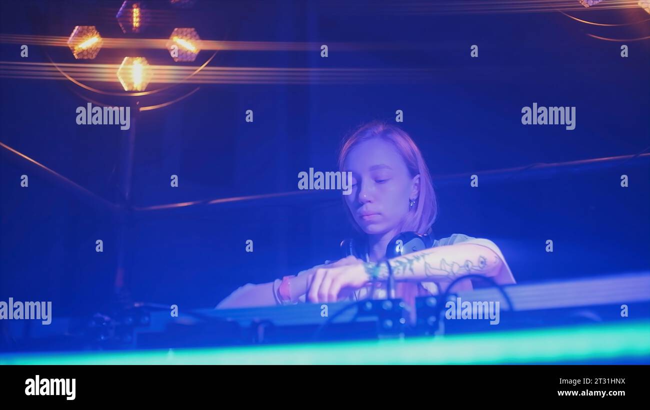 Dj in headphones moving music hi-res stock photography and images - Alamy