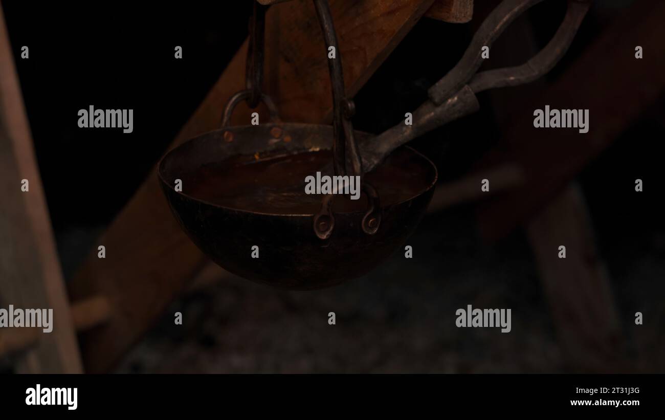 A heated boiler for working with forging iron. Media. A burning and ...