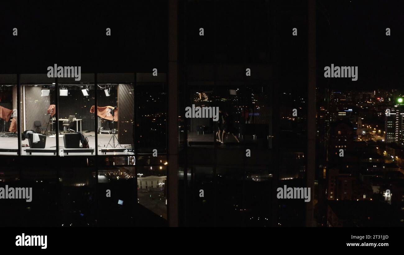 Boxers in skyscraper. Stock footage. Top view of people in apartments ...