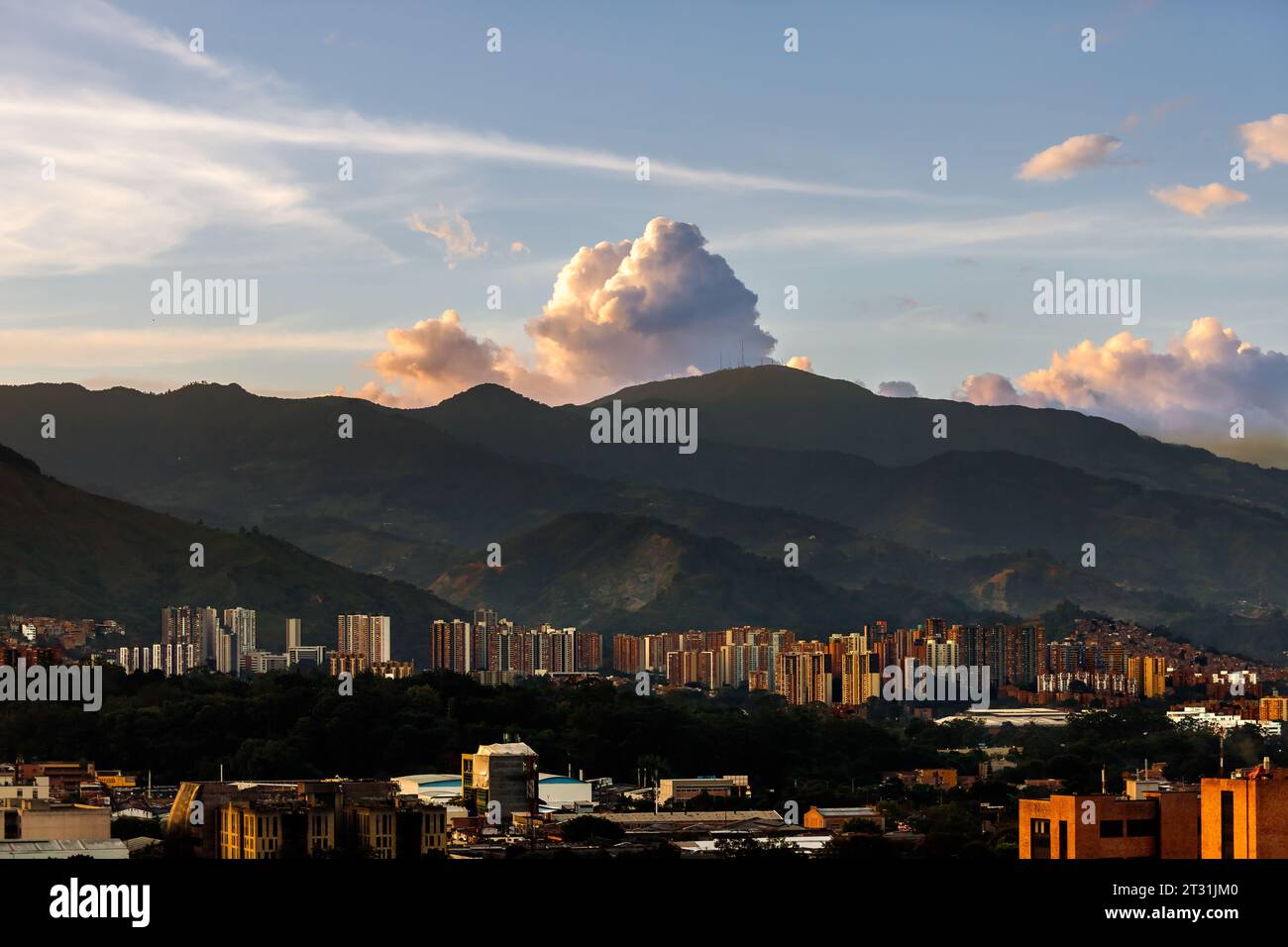 Hills with buildings in Medellin, Colombia, during sunset Stock Photo ...