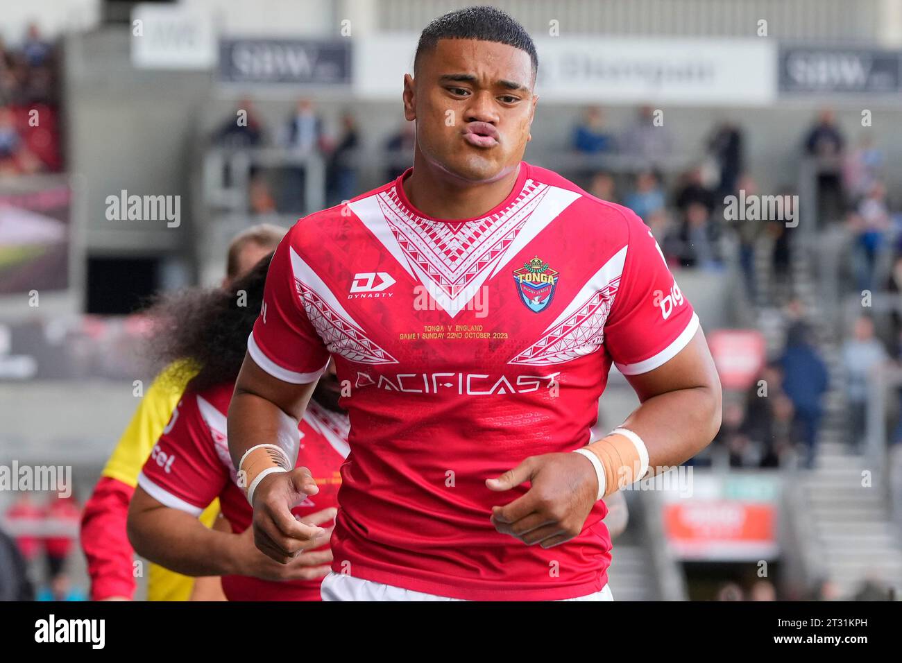 Moses Suli # of Tonga runs out to warm up before the Rugby League ...