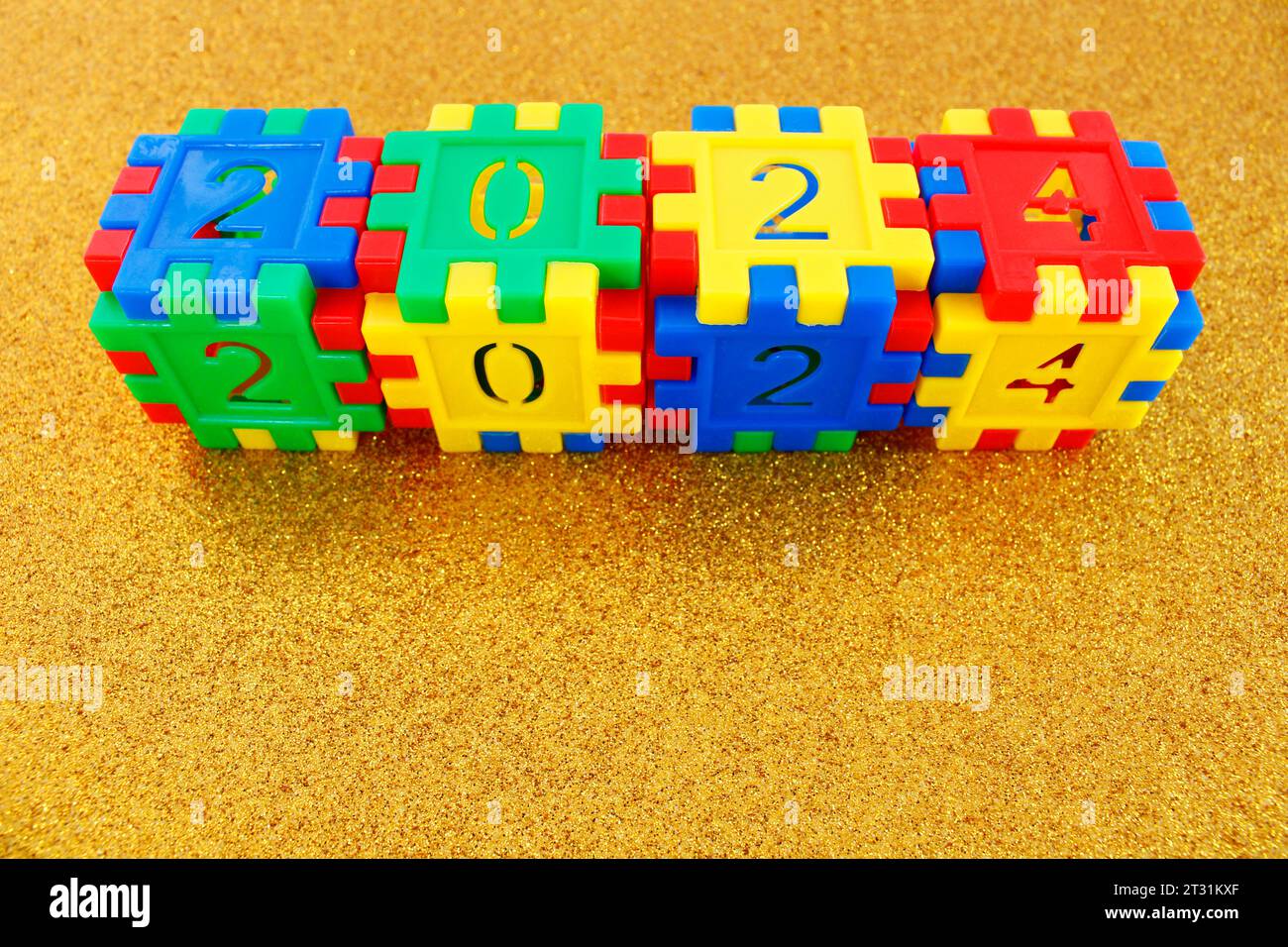 Year 2024, colorful puzzle cubes with numbers Stock Photo - Alamy